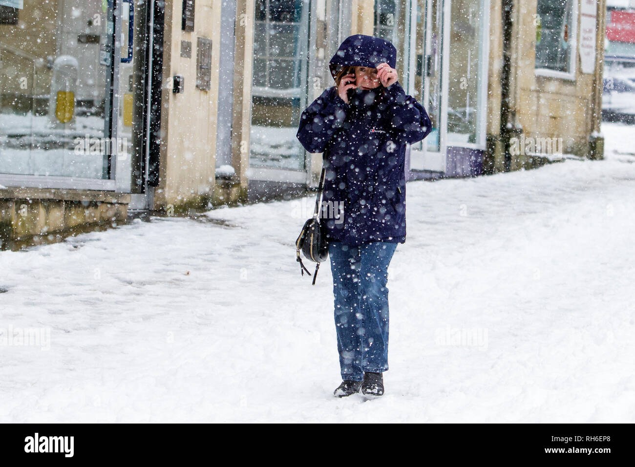 Woman in storm hi-res stock photography and images - Alamy