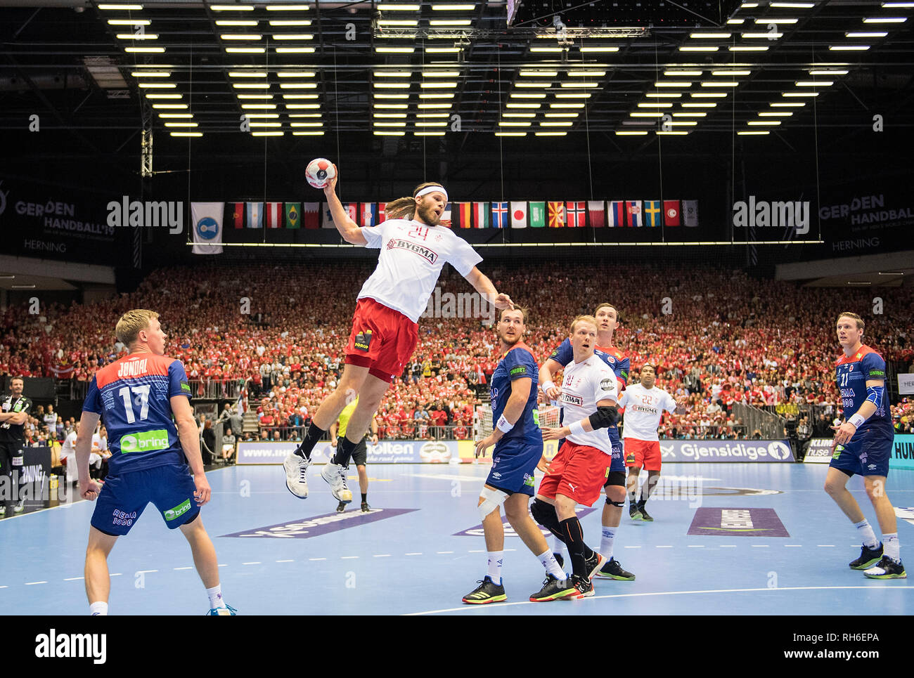 Jump shot by Mikkel HANSEN (DEN) action, Magnus JONDAL l. (NOR) is ...