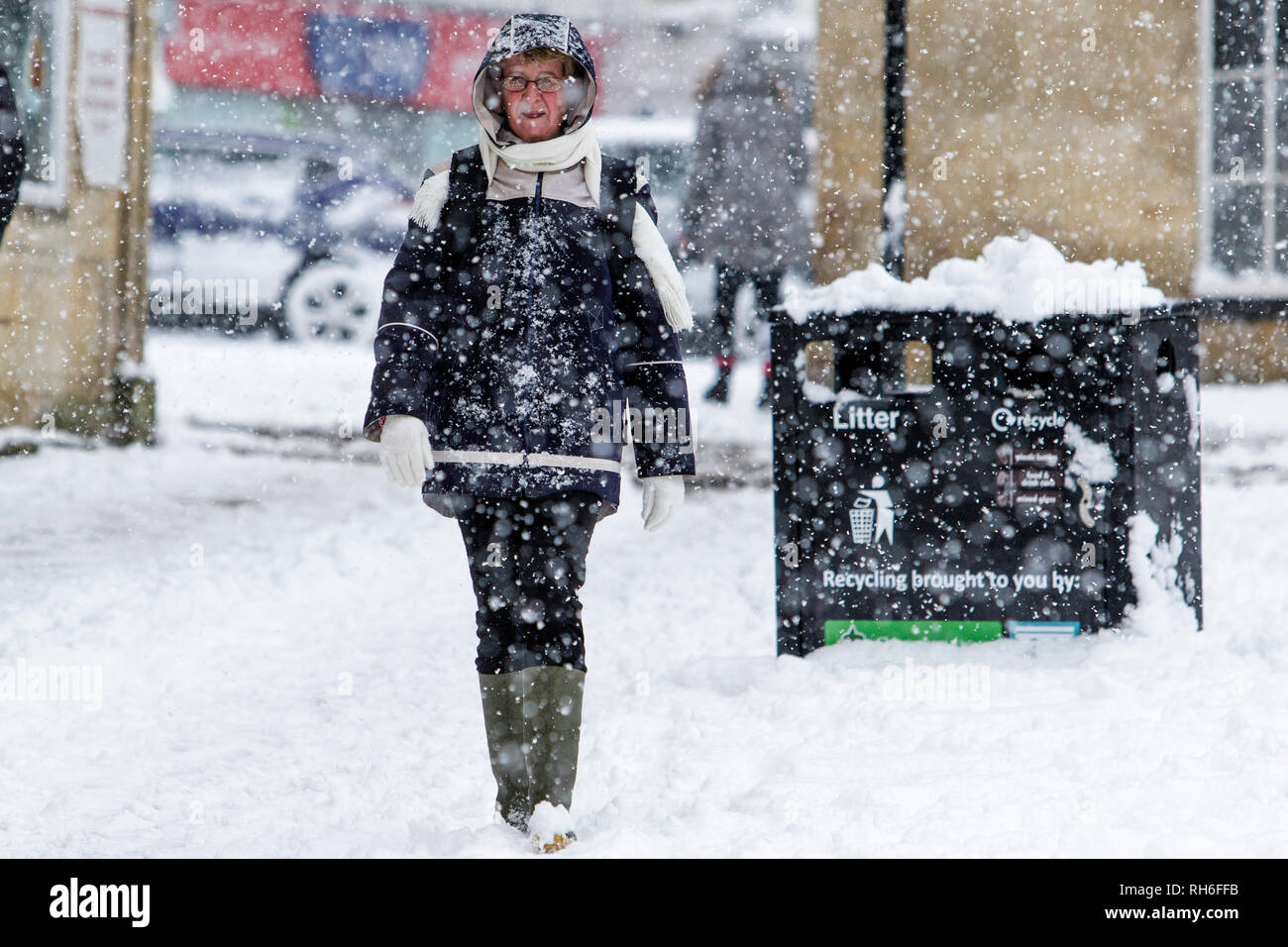 Uk people walking in snow storm blizzard hi-res stock photography and ...