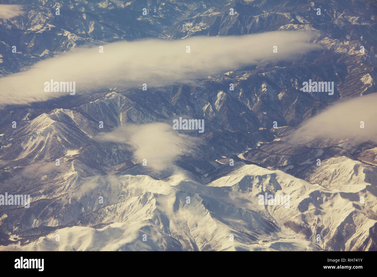 Aerial view from aircraft flying in high altitude. Landscape from above ...