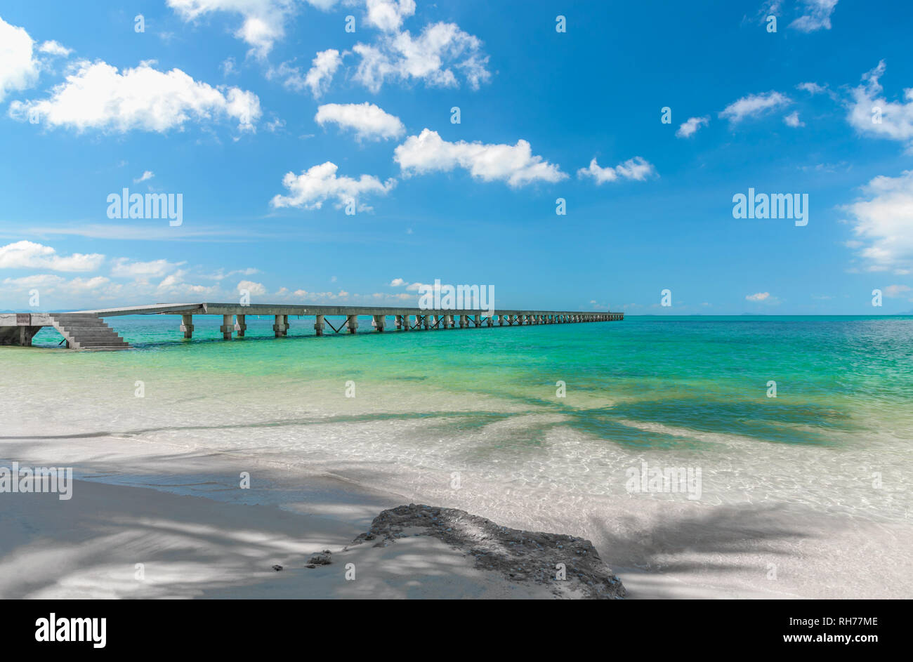 Concrete bridge on the beach to the sea. sunny day Stock Photo - Alamy