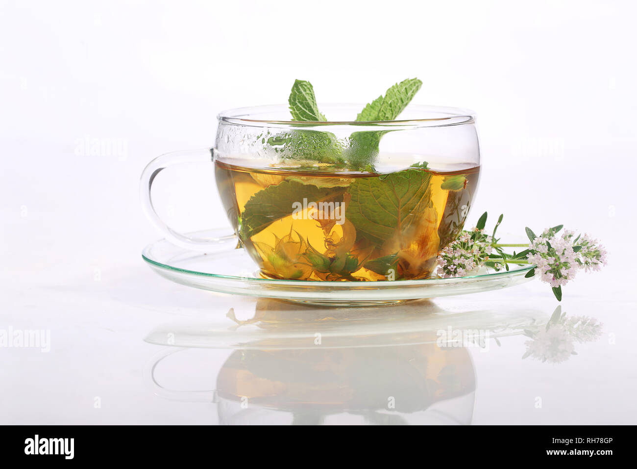 Tea with mint on a white background Stock Photo - Alamy