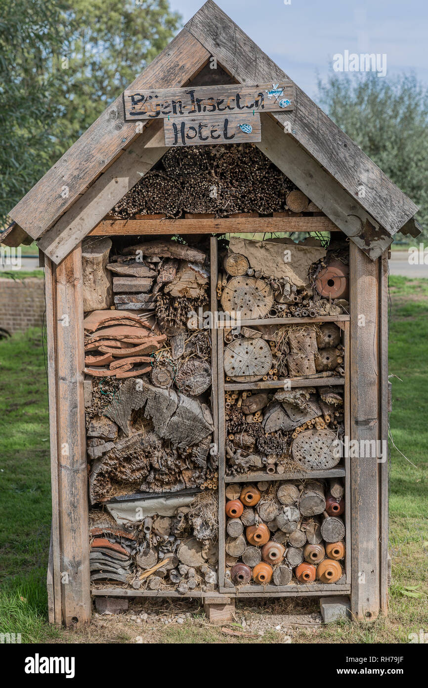 Hotel for insects that is in a park on a wonderful sunny day in the ...