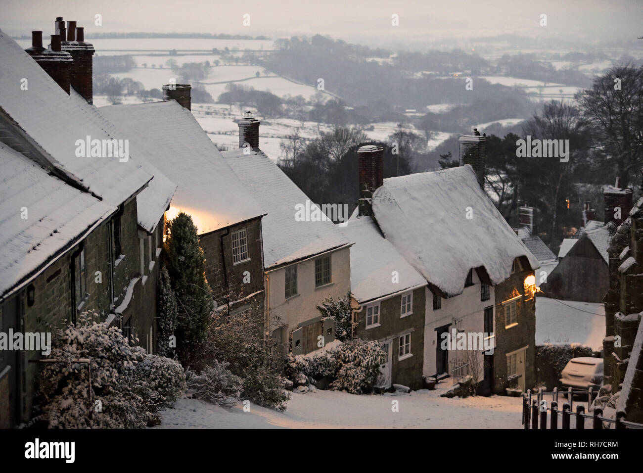 Snow covers houses in Gold Hill, in Shaftesbury, Dorset, after ...