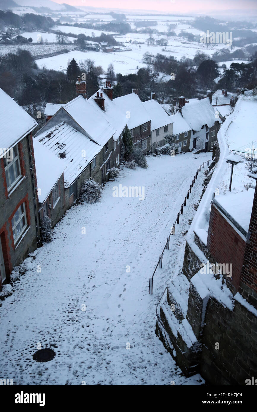 Snow covers houses in Gold Hill, in Shaftesbury, Dorset, after ...