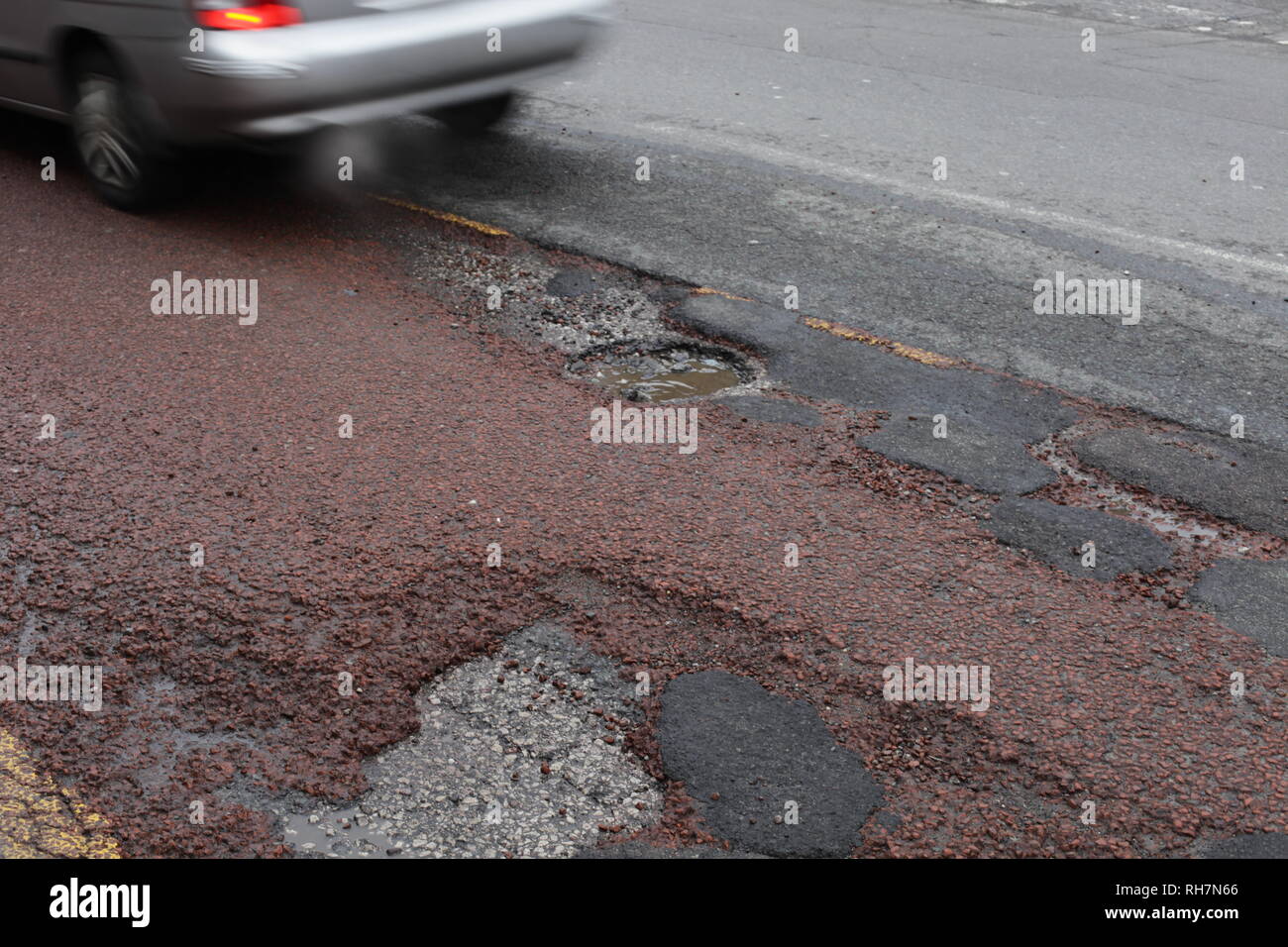 Dangerous potholes on road hi-res stock photography and images - Alamy