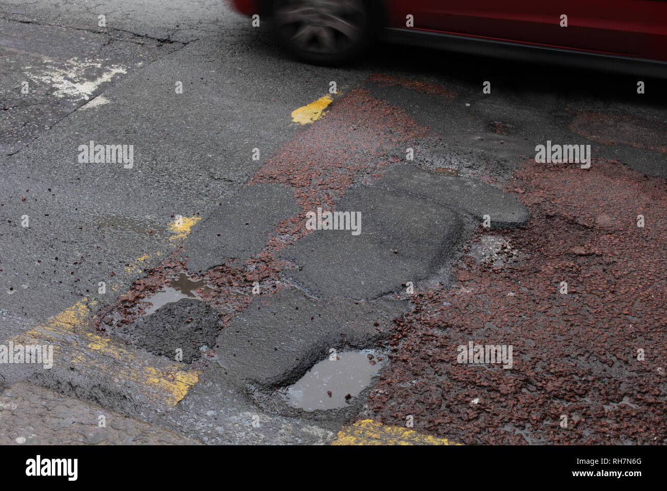 Potholes on a London road, England, Britain Stock Photo - Alamy