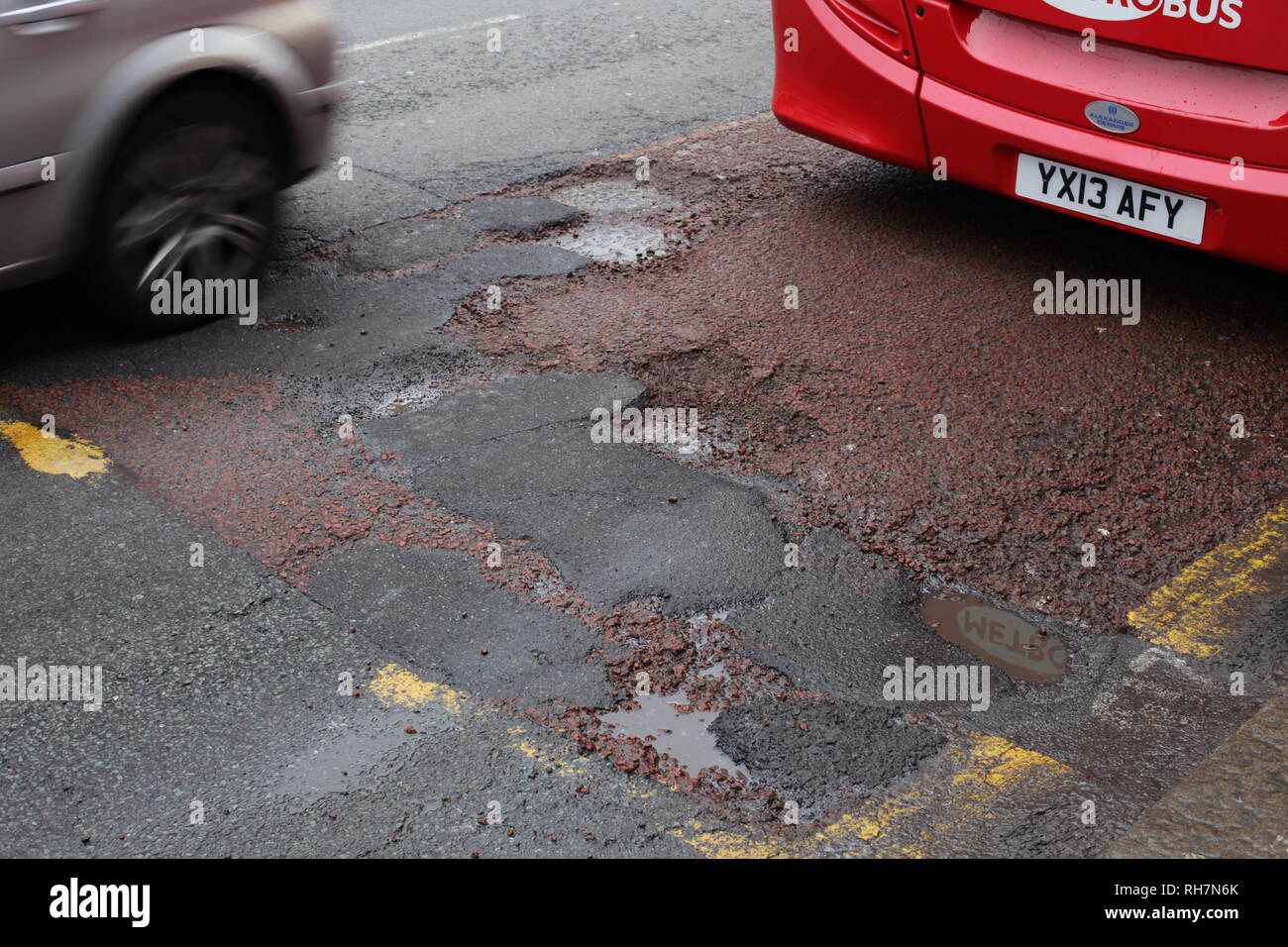 Dangerous potholes on road hi-res stock photography and images - Alamy