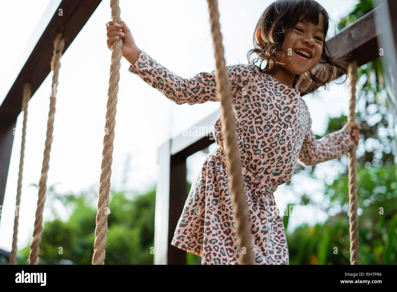 Child balancing face hi-res stock photography and images - Alamy