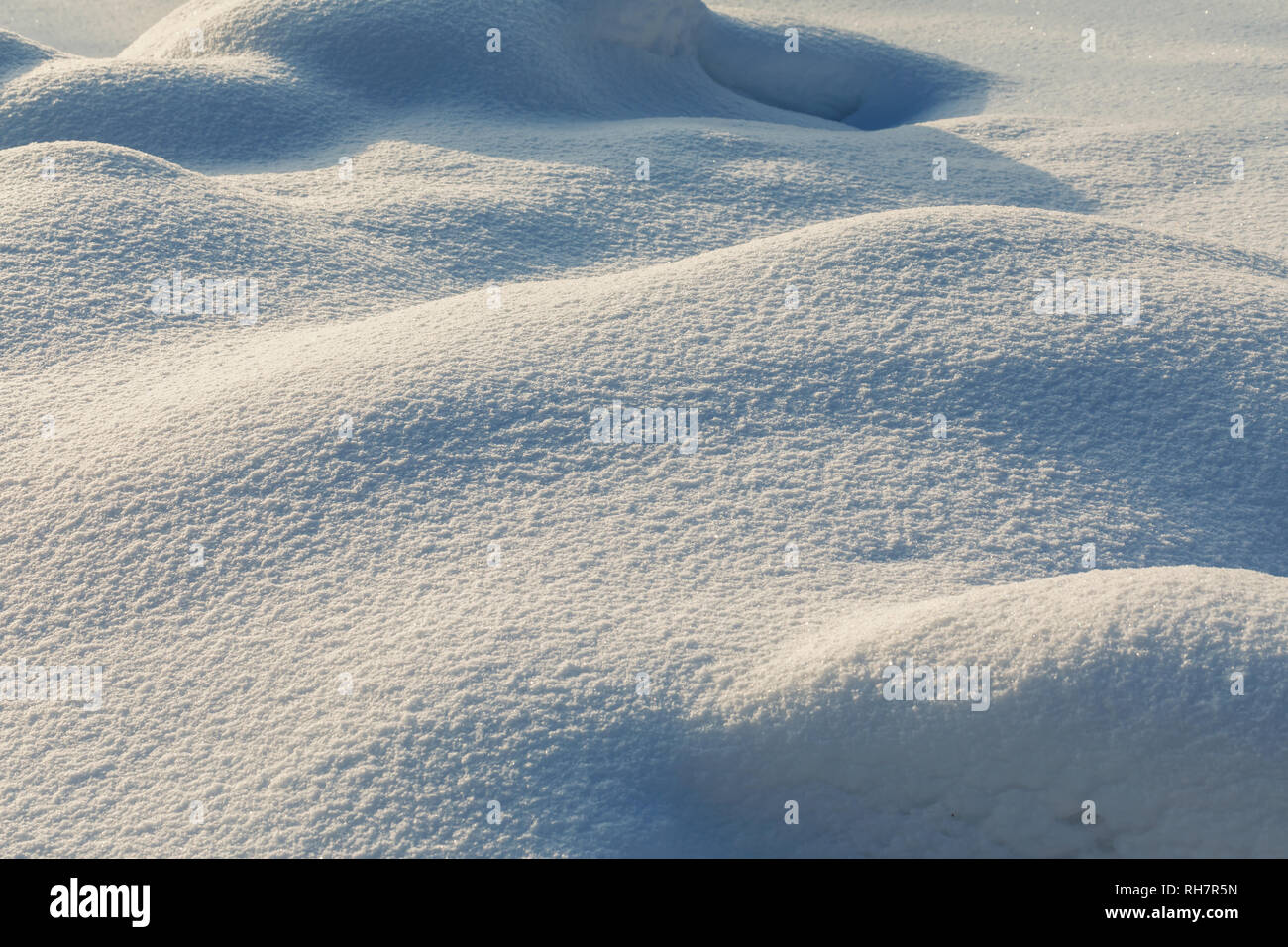 Land relief covered with snow. Background Stock Photo - Alamy