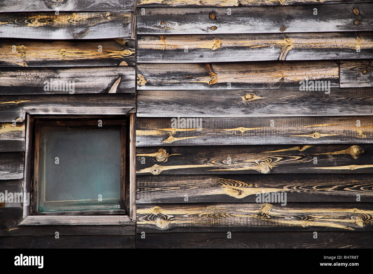 Window on a rustic wooden facade Stock Photo - Alamy
