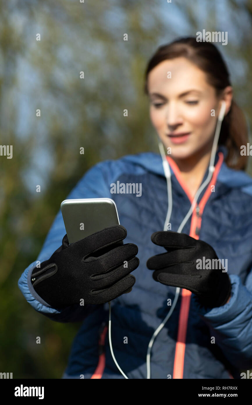 Woman listening on mobile phone hi-res stock photography and images - Alamy