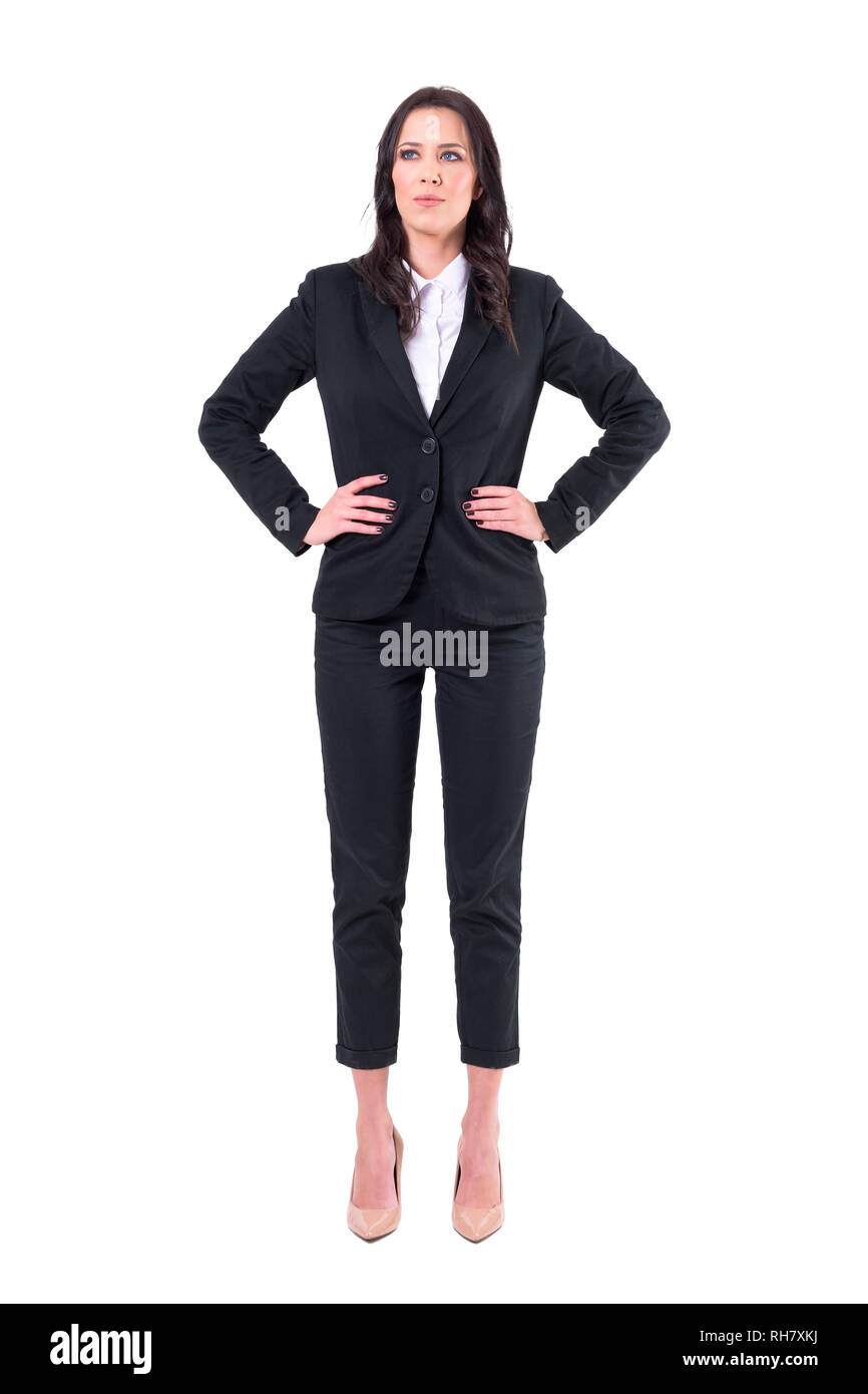 Successful confident businesswoman manager standing with arms on hips ...