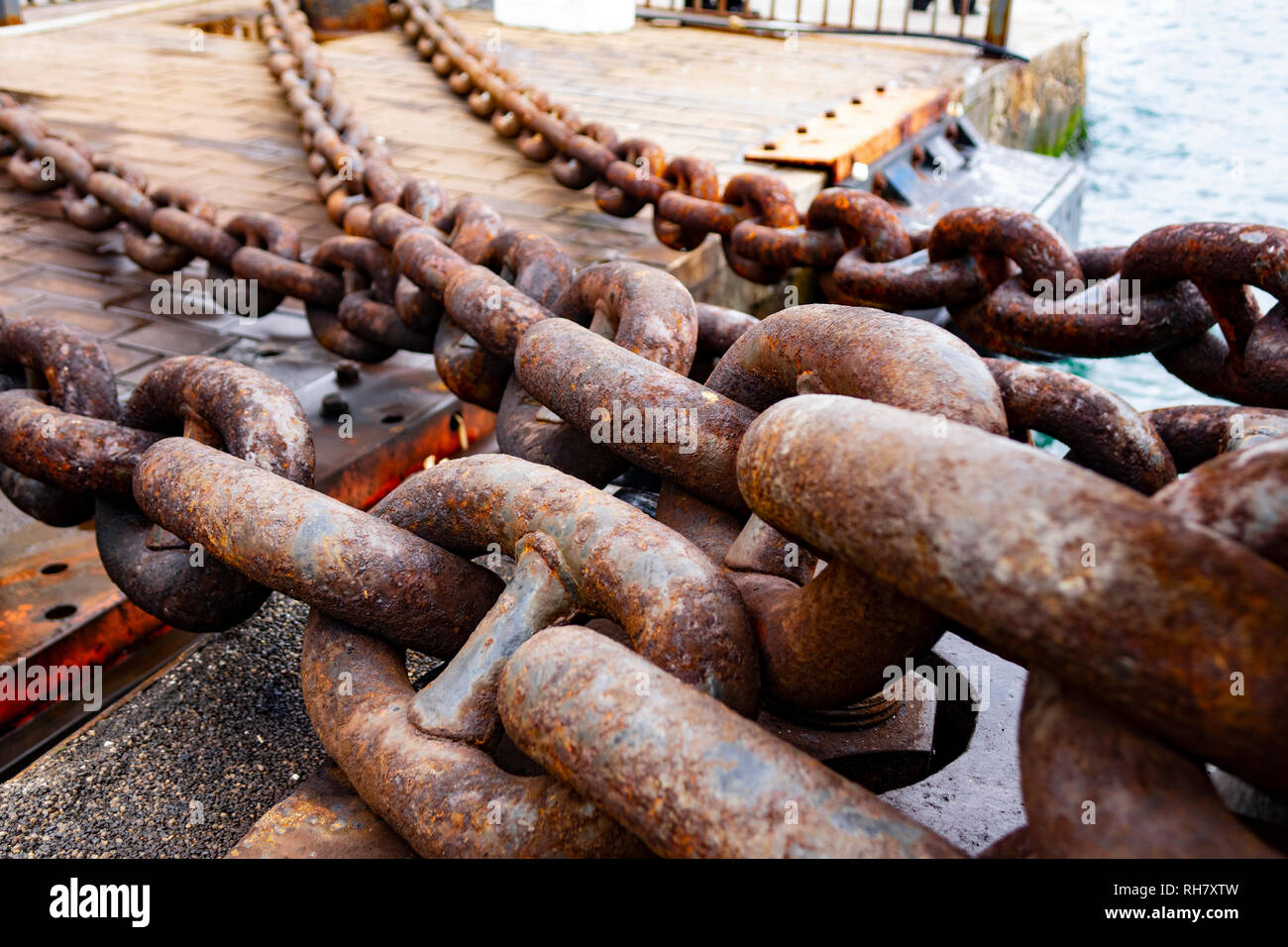 Close up of old rusty chain, industrial port with chainss, crane ...