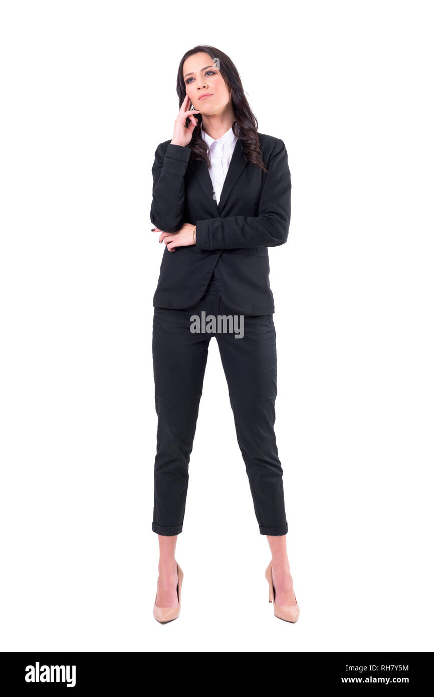 Mindful attentive corporate woman in business suit looking up ...