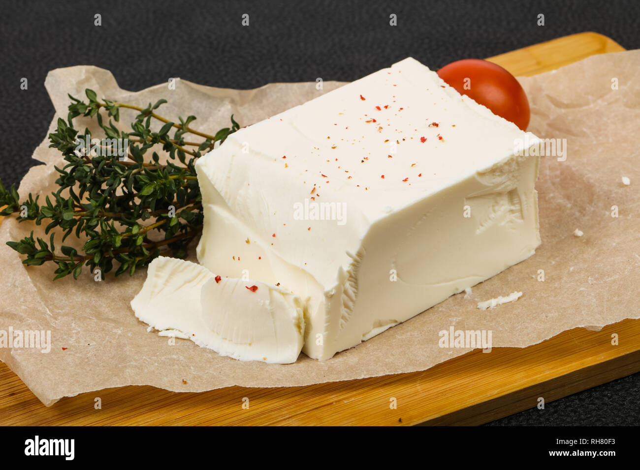 Traditional Feta Cheese served thyme Stock Photo - Alamy