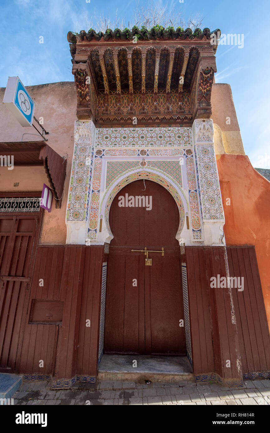 Traditional Moroccan style design of an ancient wooden entry door. In ...