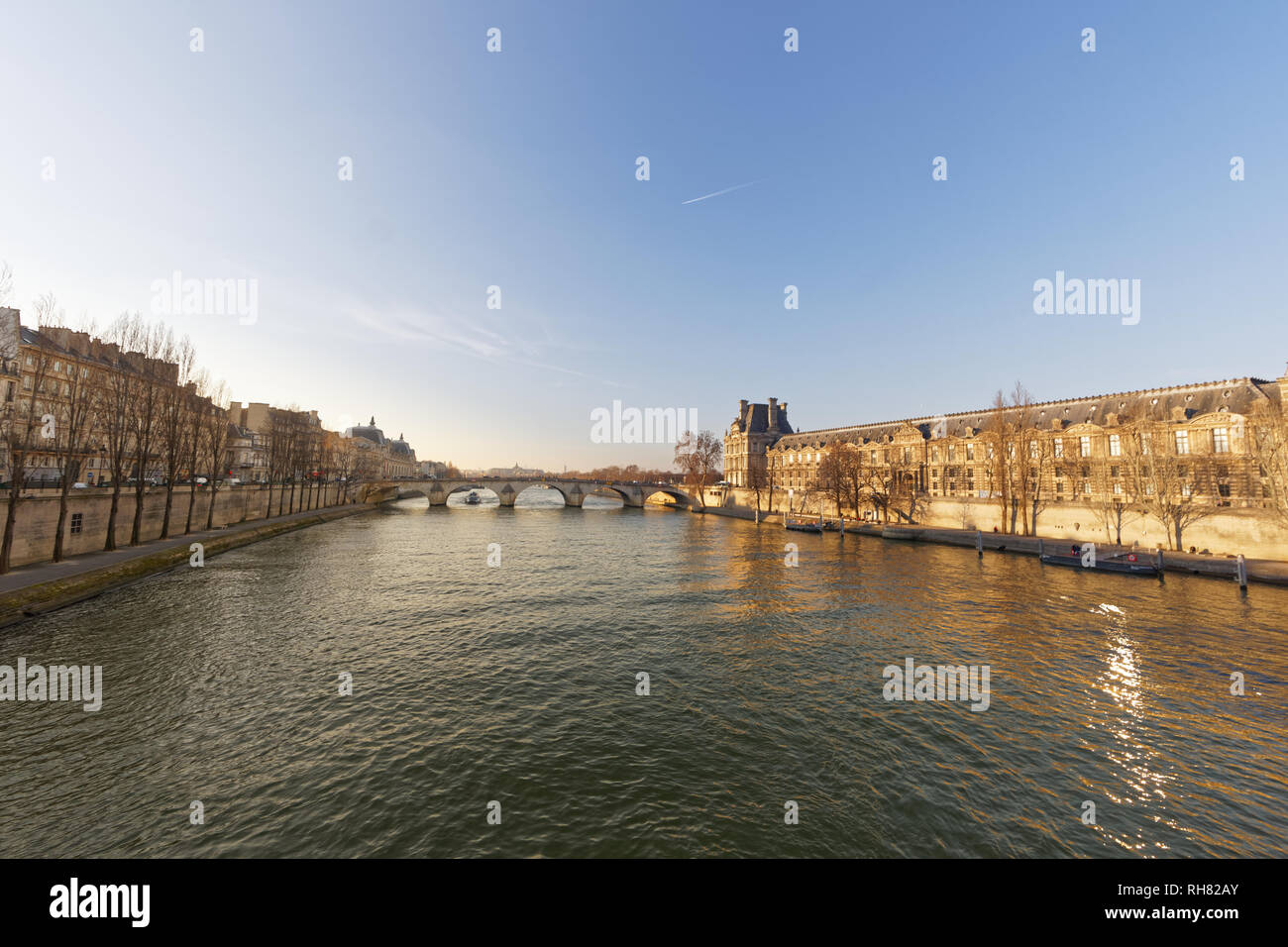 Louvre Palace in front of Seine river - Paris, France Stock Photo - Alamy