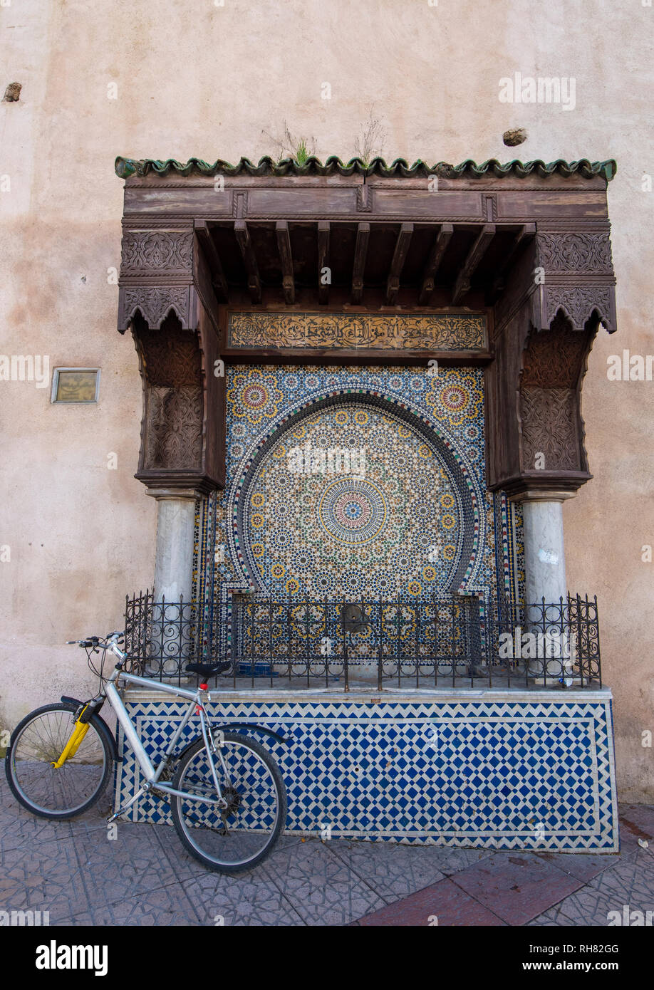 Traditional ornamental drinking fountain in medina. Decorated fountain ...