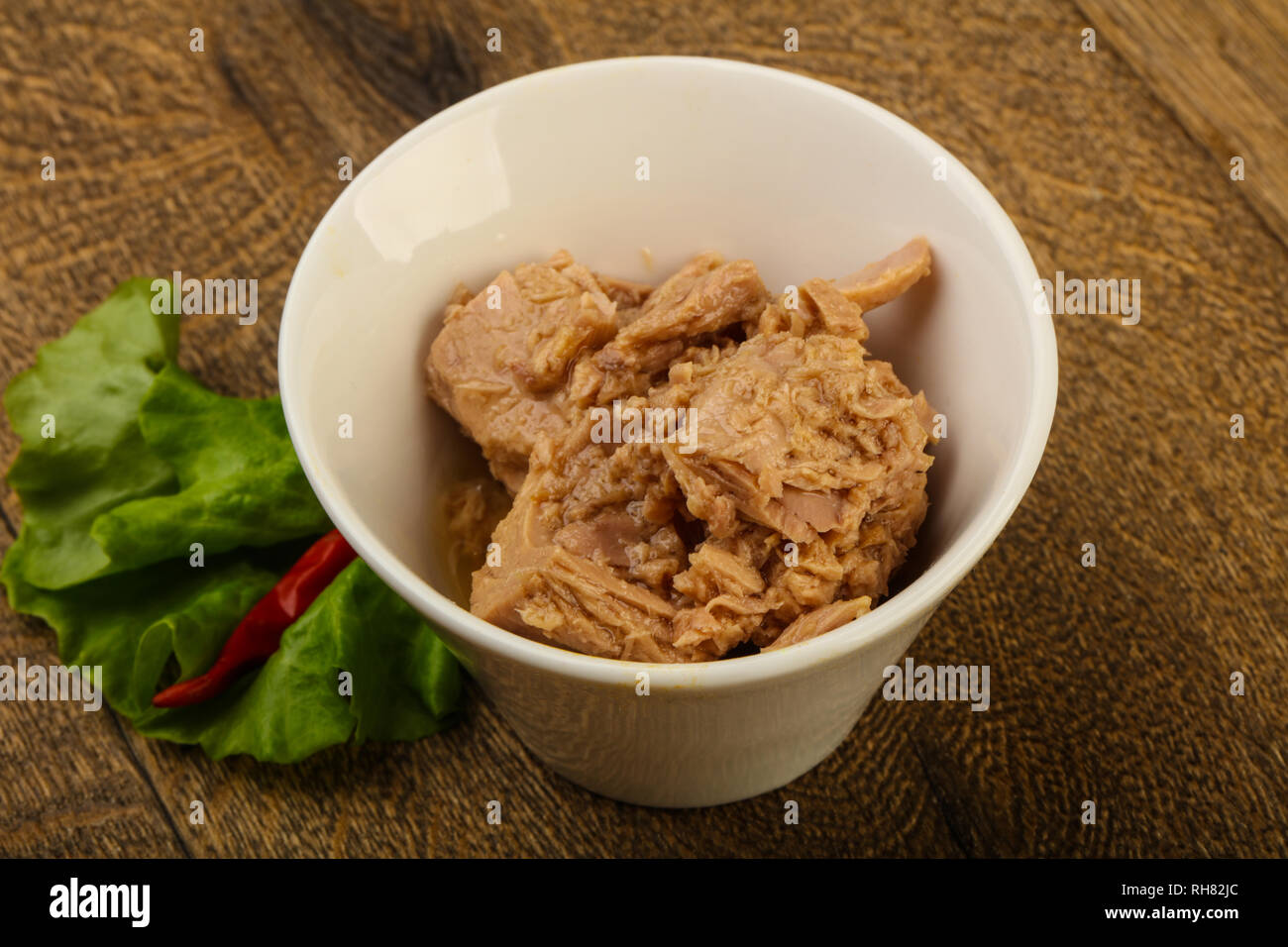 Canned tuna fish in the bowl ready for cooking Stock Photo - Alamy