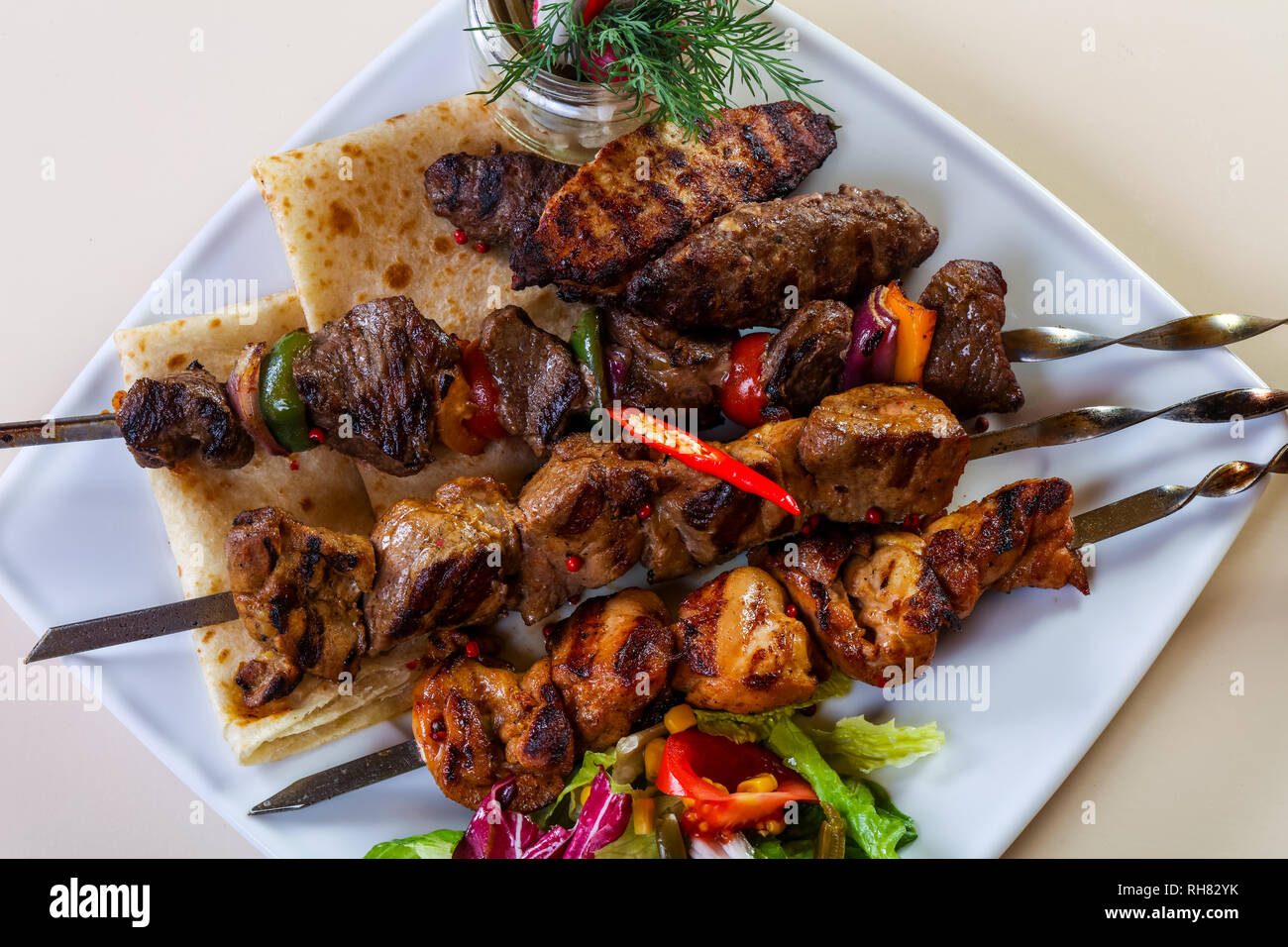 Barbeque meat mix plate with vegetalbes Stock Photo - Alamy