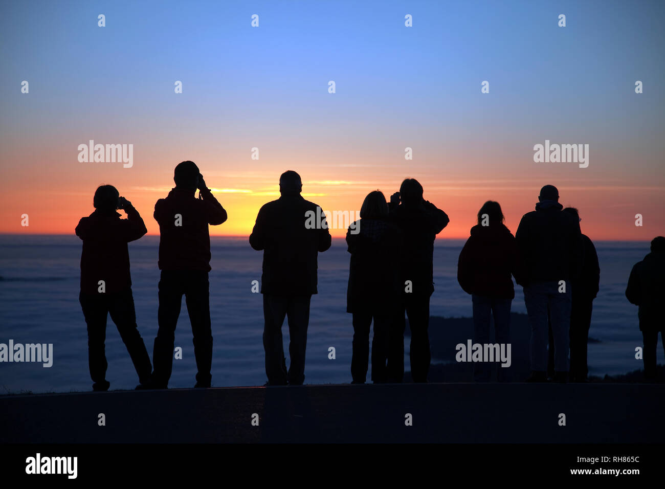 Nine people hi-res stock photography and images - Alamy