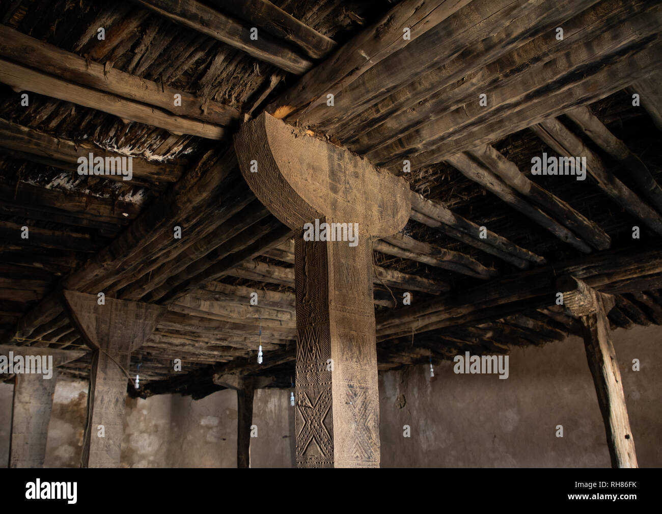 Wooden pillar in an old house of al-Namas fort, Al-Bahah region ...