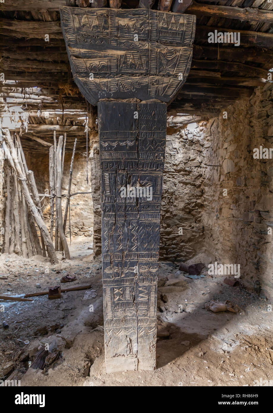 Wooden pillar in an old house of al-Namas fort, Al-Bahah region ...