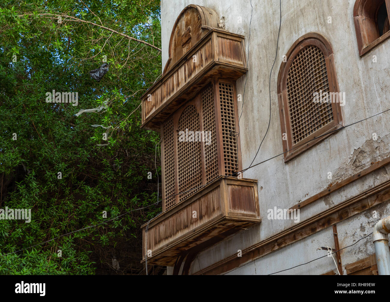 Wooden mashrabiya of an old house in al-Balad quarter, Mecca province ...