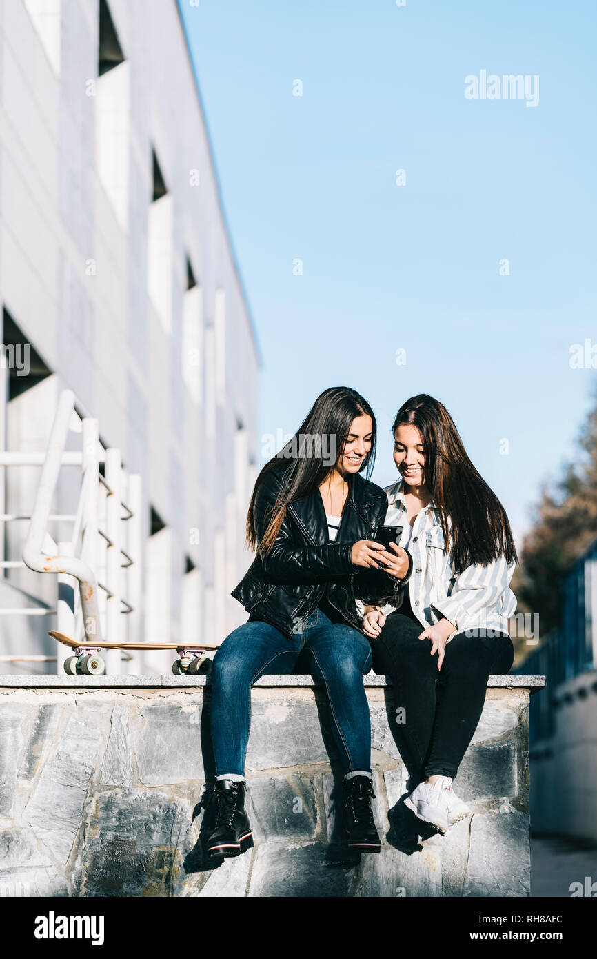 girls using mobile phone Stock Photo - Alamy