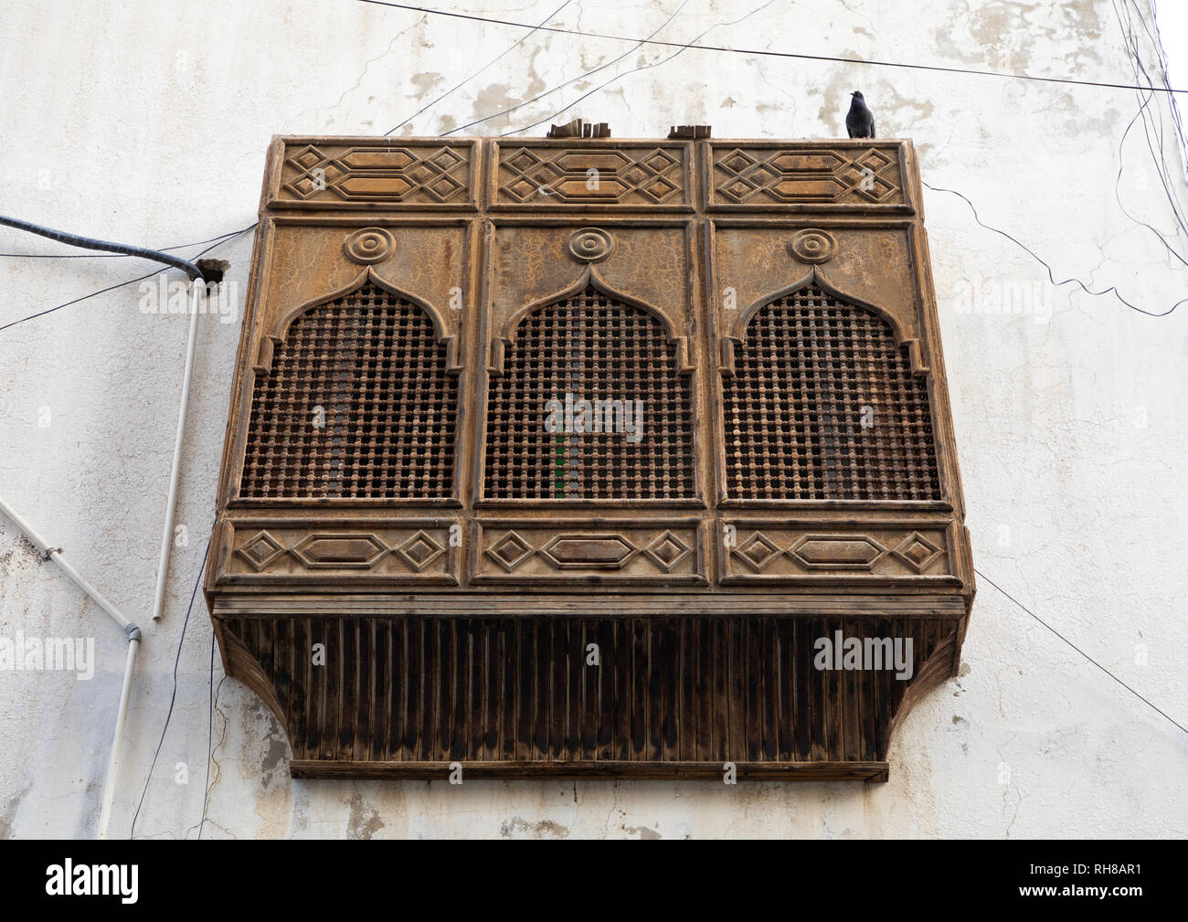 Wooden mashrabiya of an old house in al-Balad quarter, Mecca province ...