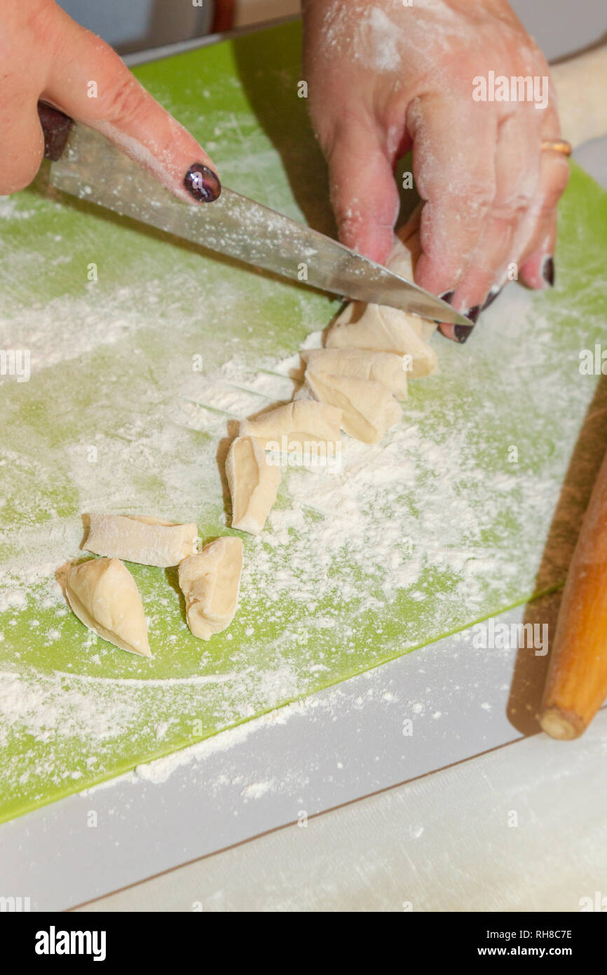 Preparation for cooking homemade dumplings woman chef at home Stock ...