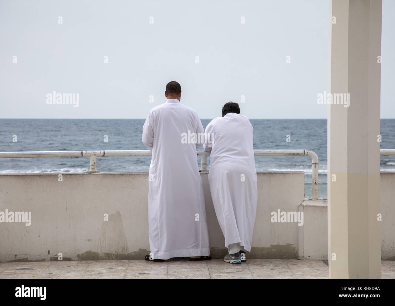 Saudi men looking at the sea, Mecca province, Jeddah, Saudi Arabia ...