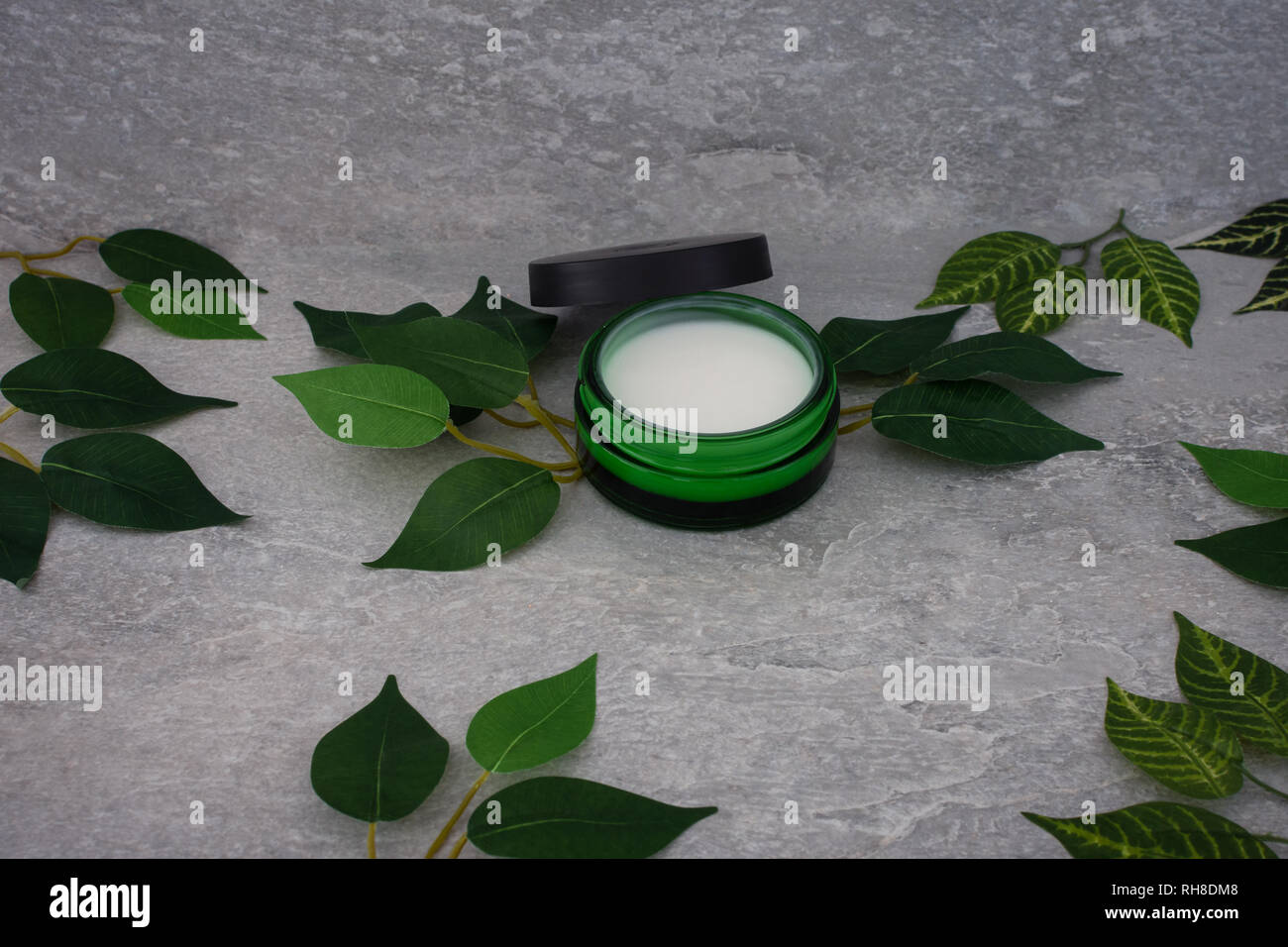 cosmetic facial cream on grey background. skincare cream. facial beauty ...