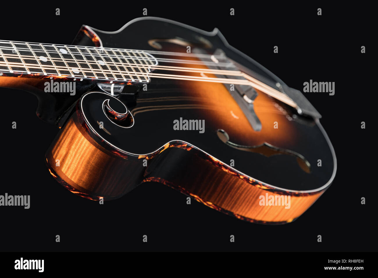 Mandolin isolated on black background. Music concept Stock Photo - Alamy