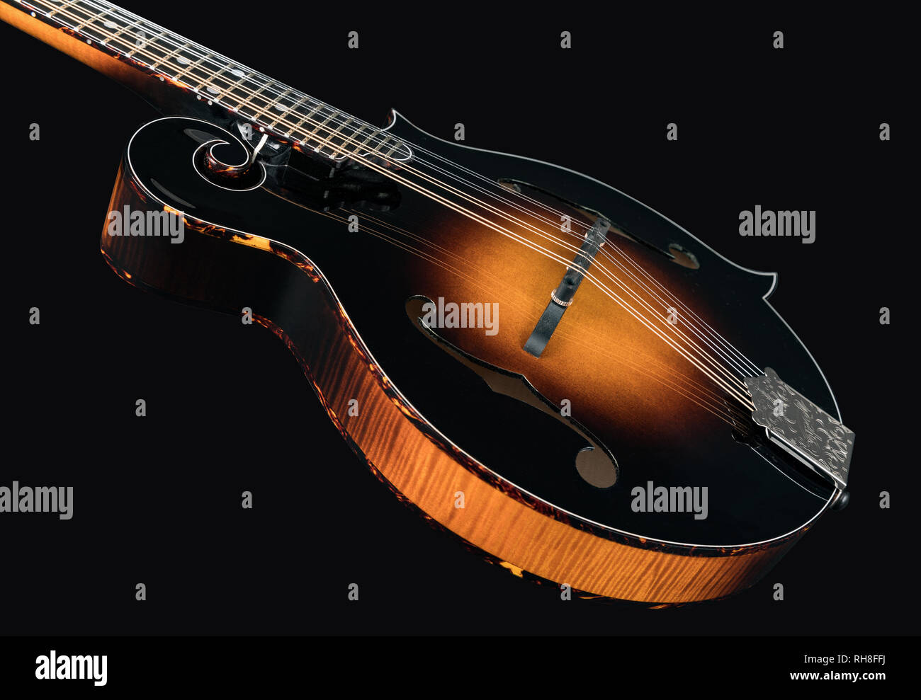 Mandolin isolated on black background. Music concept Stock Photo - Alamy