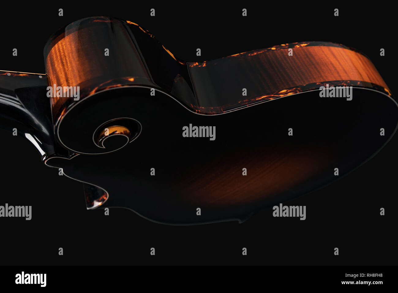 Mandolin isolated on black background. Music concept Stock Photo - Alamy