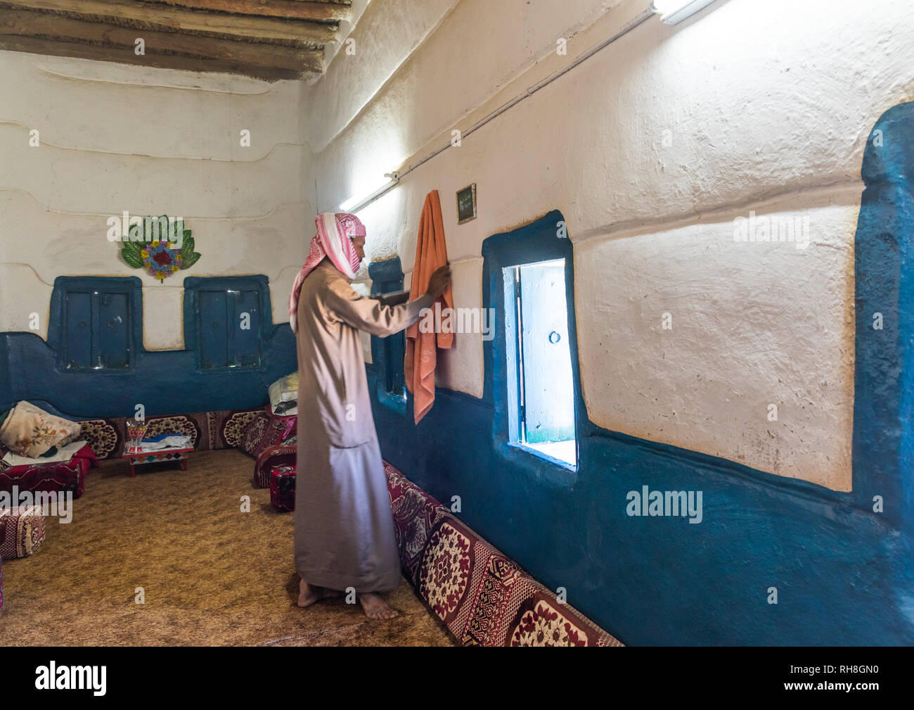 Saudi farmer in his traditional house, Najran Province, Najran, Saudi ...