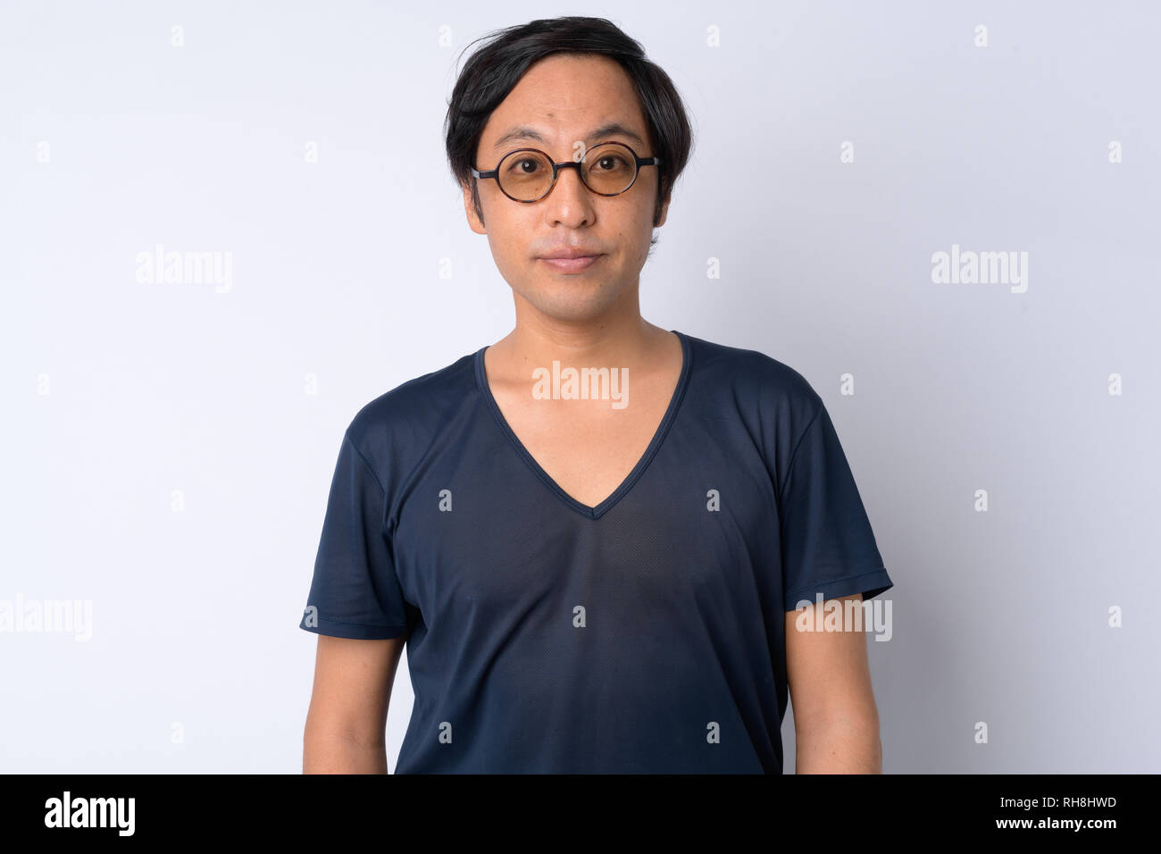 Portrait of Japanese man against white background Stock Photo - Alamy