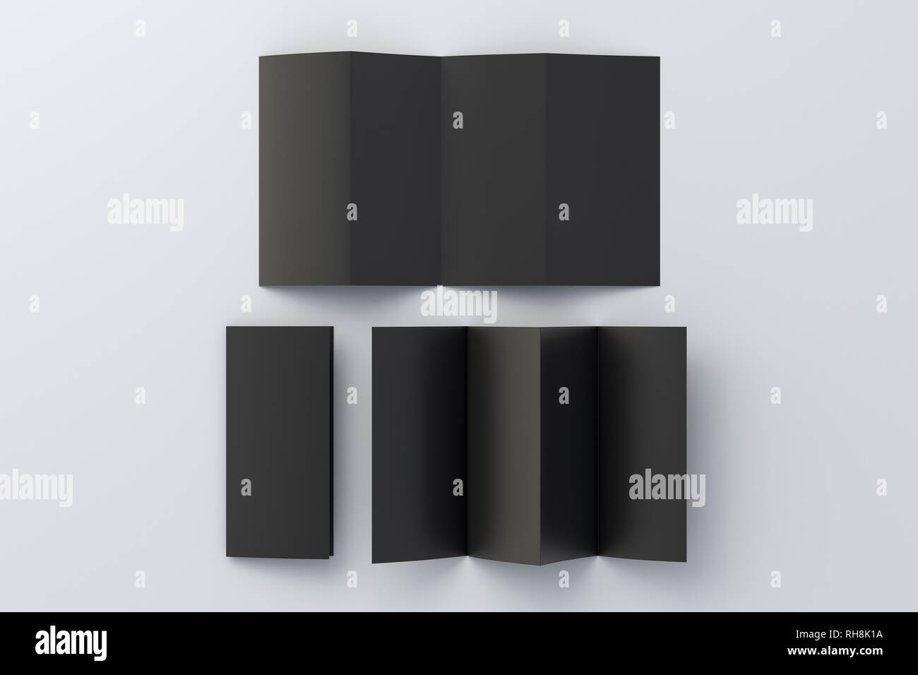 Blank black folded paper leaflet on white background. Eight pages, four ...