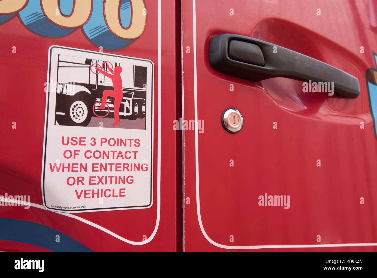 A safety sticker warning a truck driver to use 3 points of contact when ...