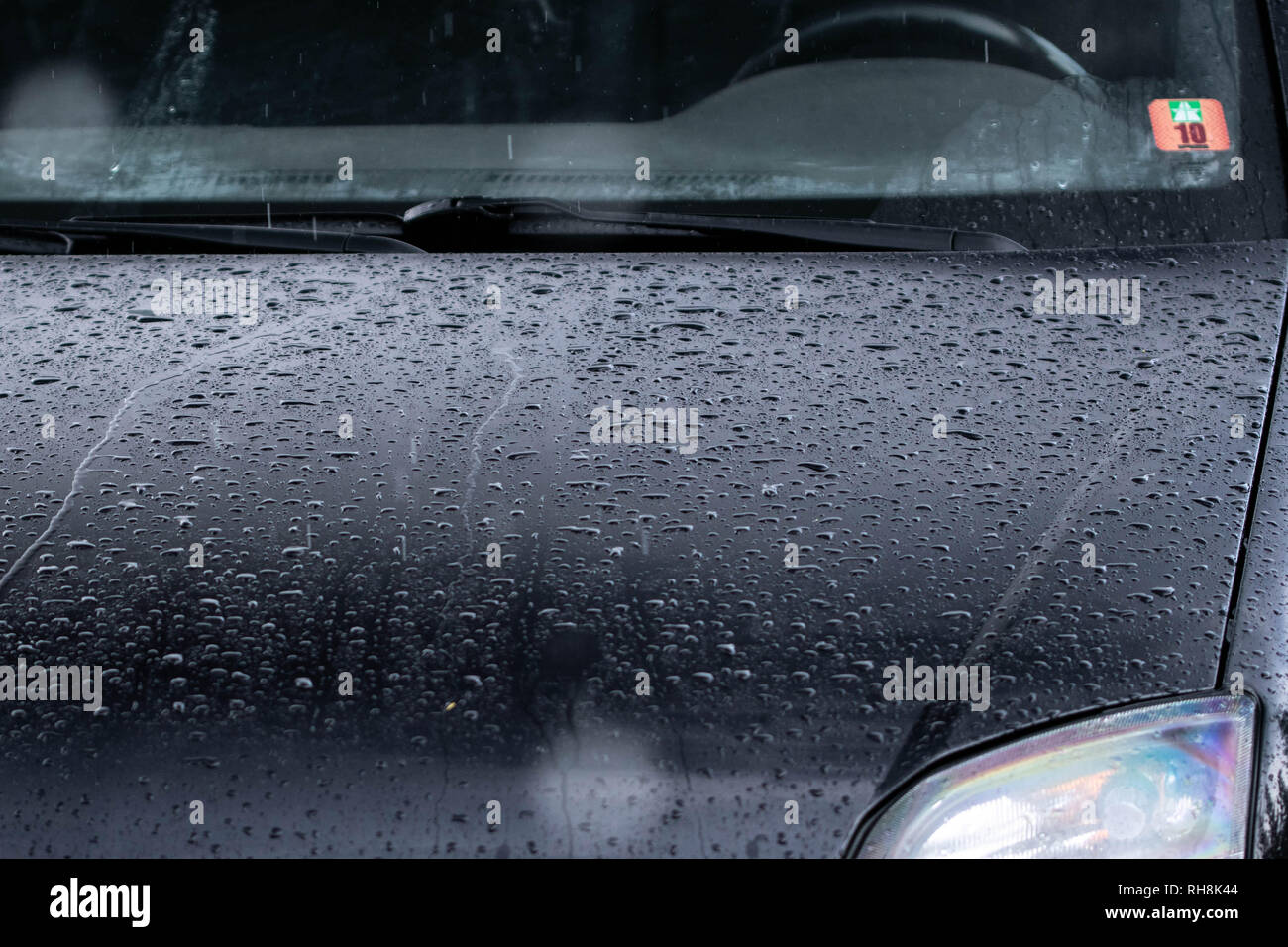 Windshield and car hood after rain with water drops Stock Photo - Alamy