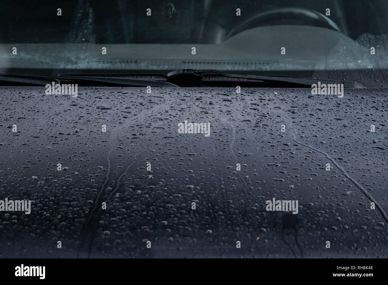 Windshield and car hood after rain with water drops Stock Photo - Alamy