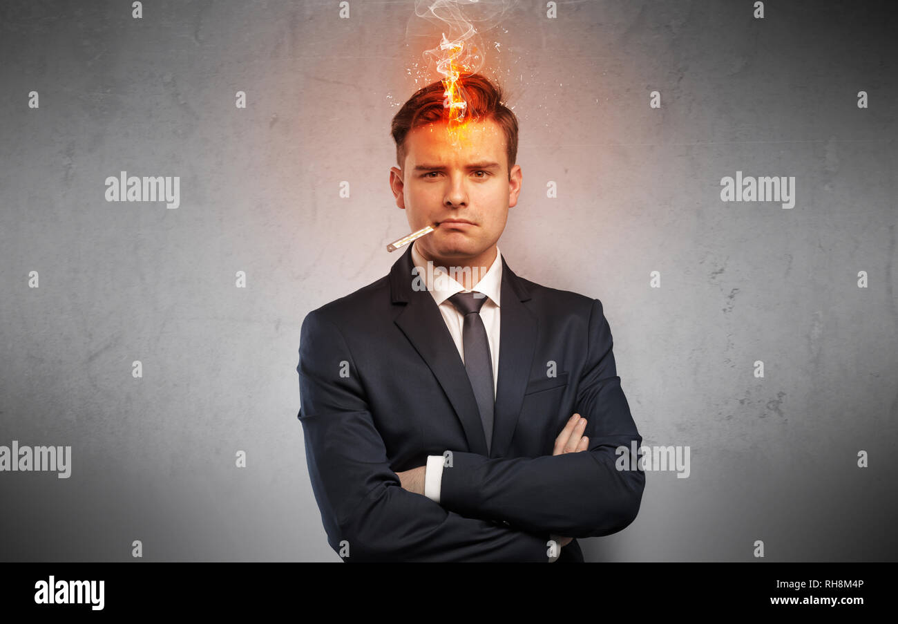 Fever businessman with burning head concept Stock Photo - Alamy