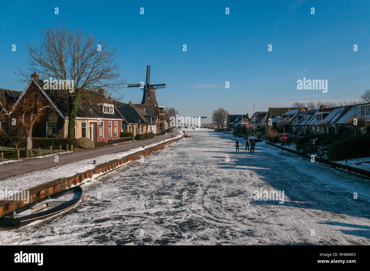 Winter and Ice skating In Friesland Stock Photo - Alamy