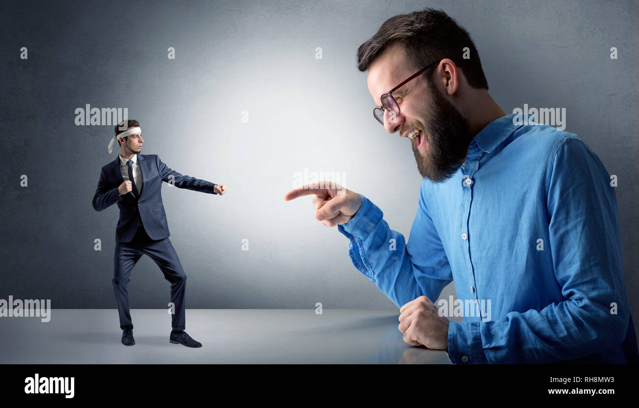 Giant hipster man yelling at a small karate man Stock Photo - Alamy