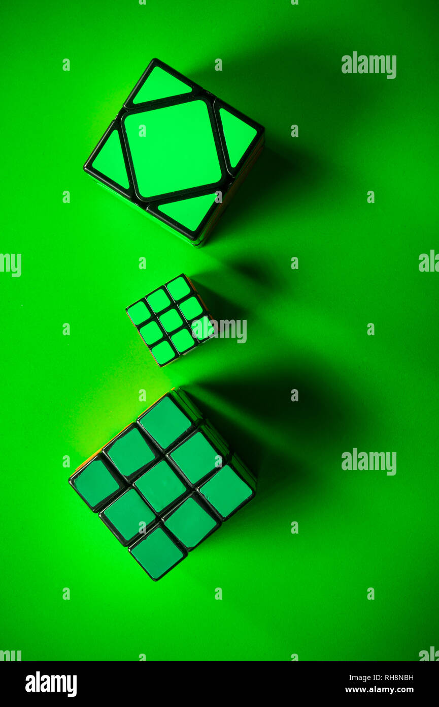 collected different conundrum on red background Stock Photo - Alamy