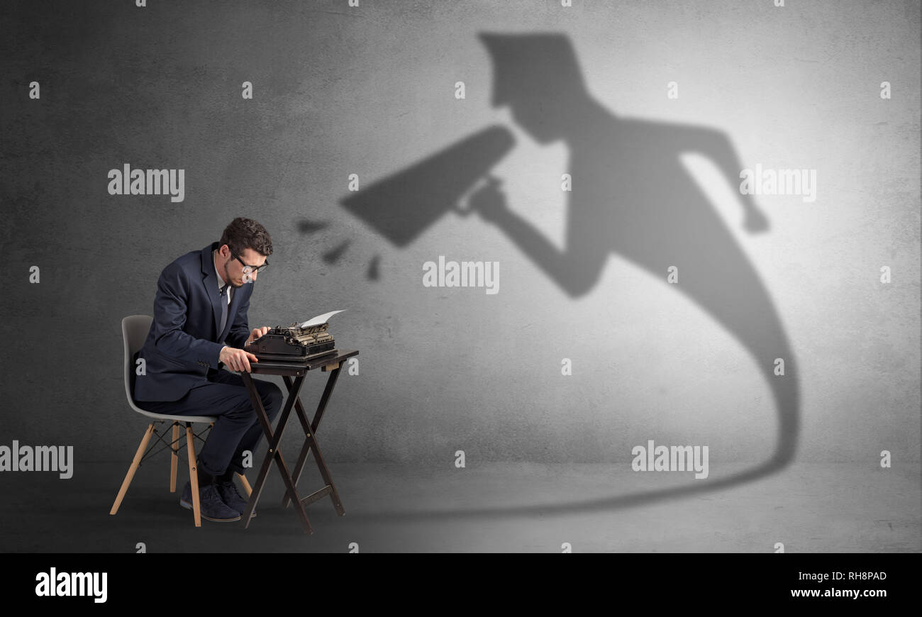 Hard working businessman shadow yelling to himself concept Stock Photo ...
