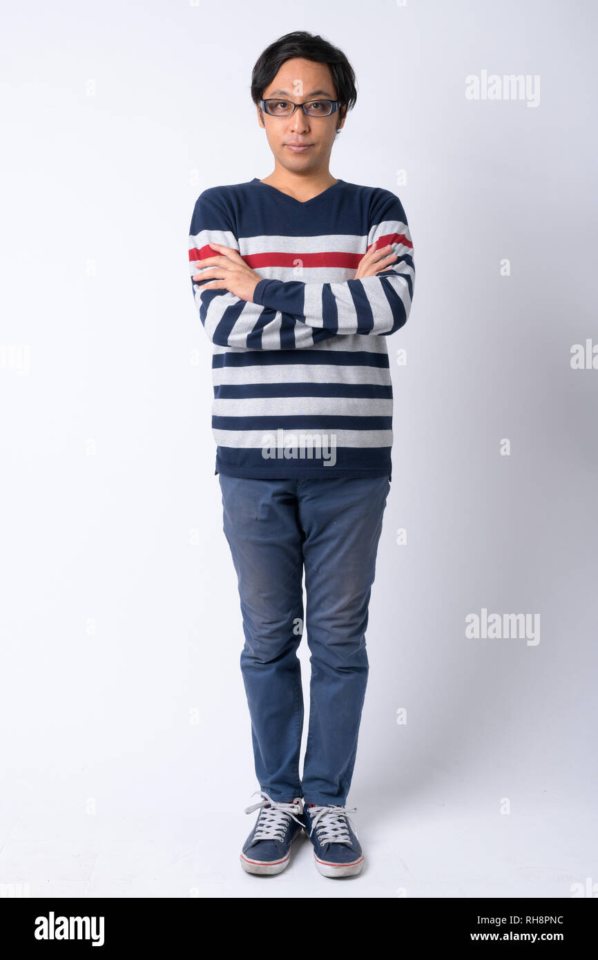 Full body shot of Japanese man with arms crossed Stock Photo - Alamy