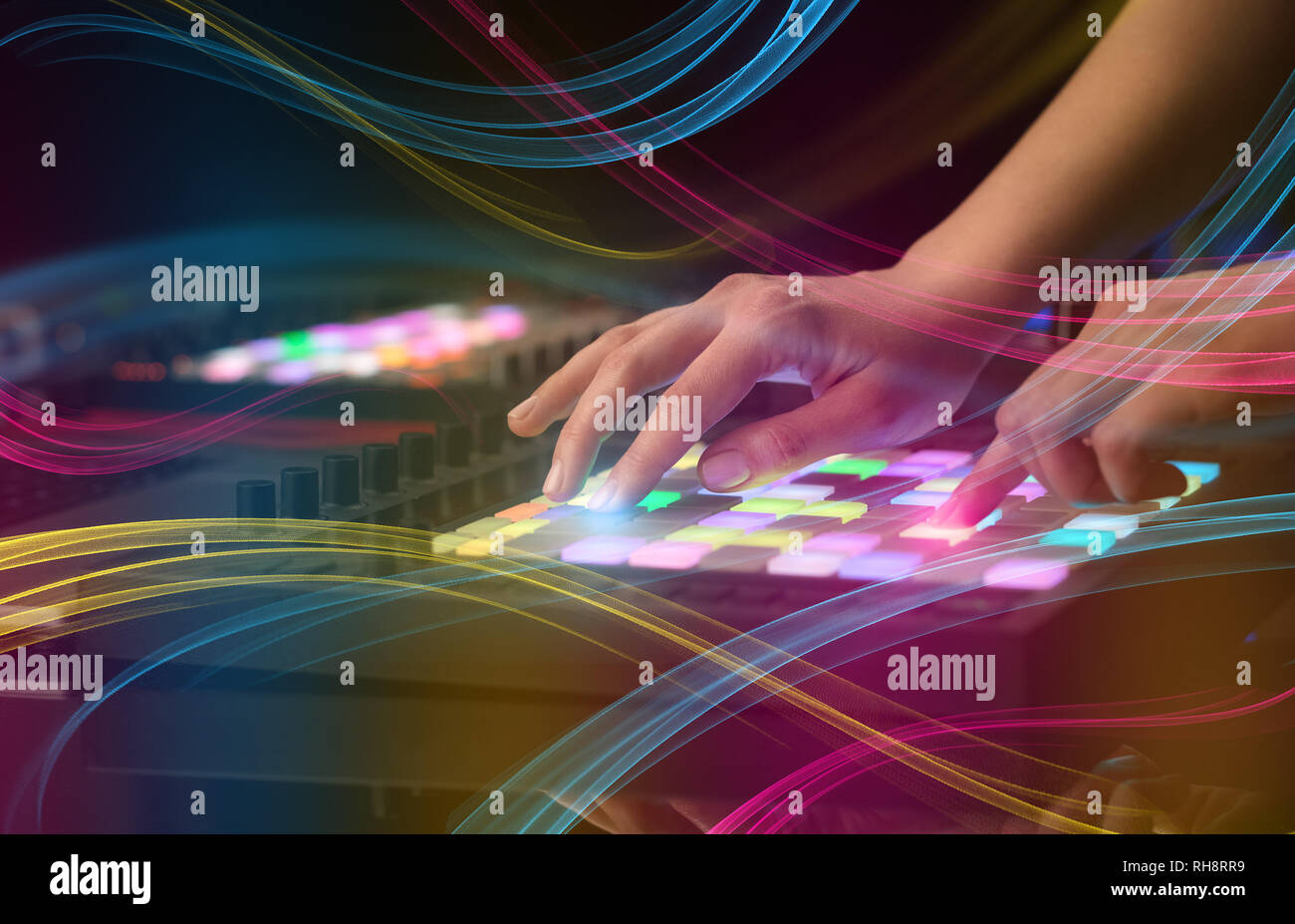 Hand mixing music on midi controller with colorful vibe concept Stock ...